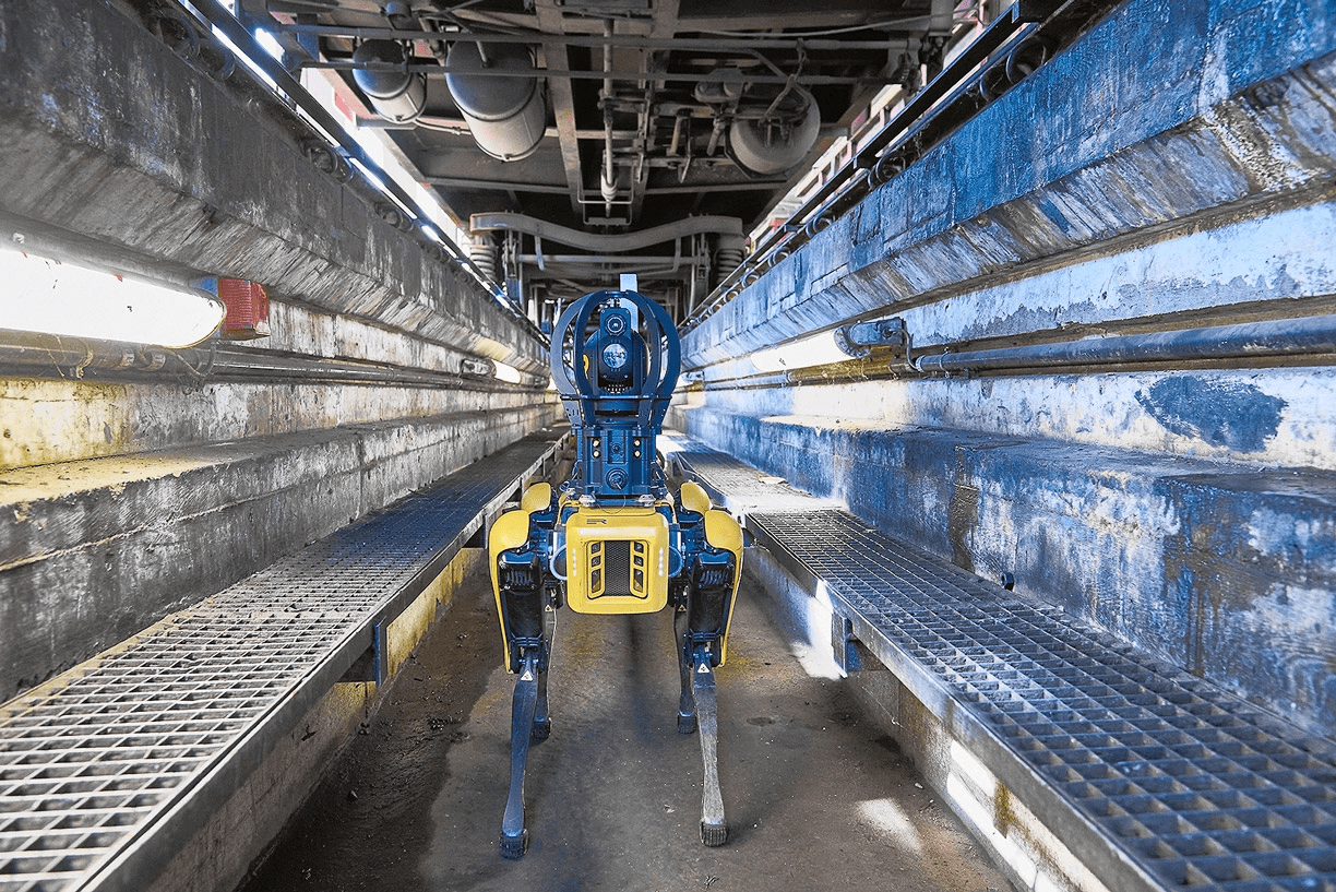 The robot is inspecting the wheelset axles of freight cars - Railway Supply
